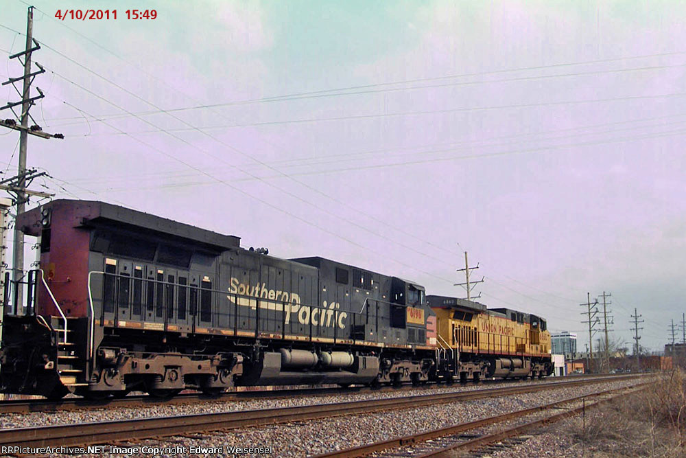 UP 6860 & patch sister 6196 head south @ Burleigh Av.